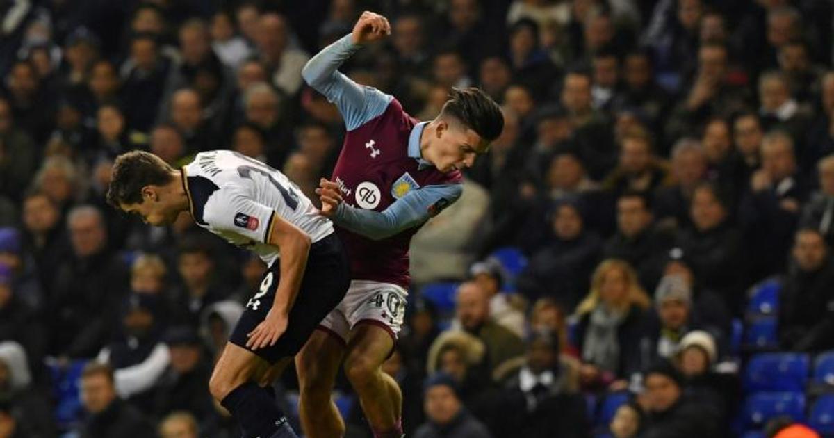 Day of shame: Villa star punched by fan and Arsenal pitch invader ...