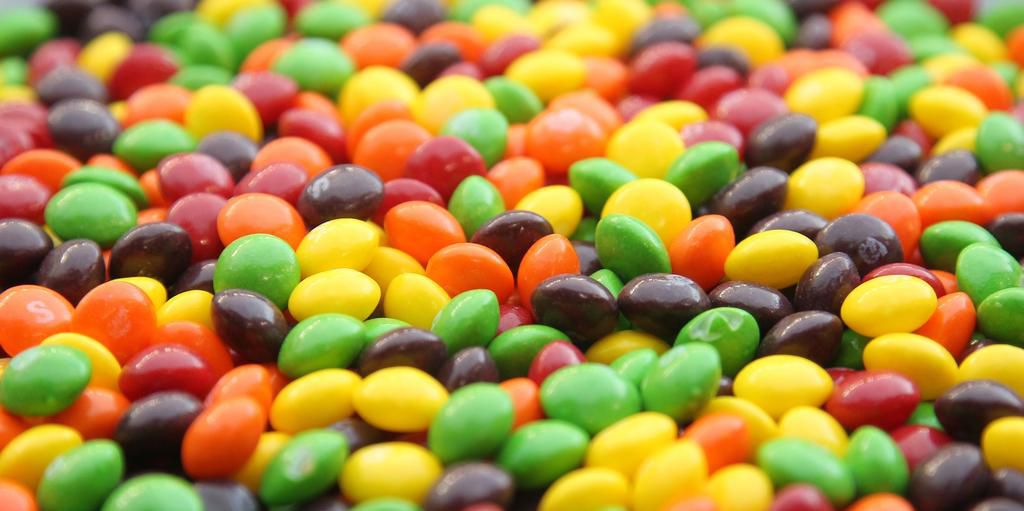 Watch Dr. Pimple Popper Pop Out Colorful 'Skittle' Cysts from a Patient ...