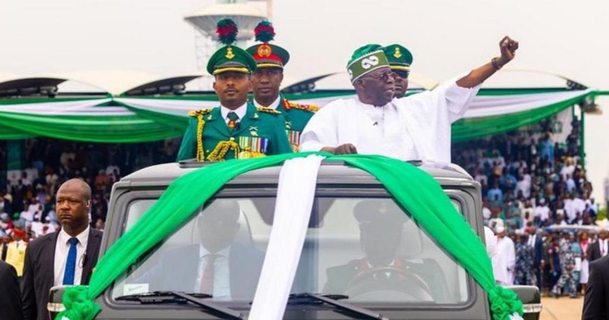 Nigeria's President Bola Tinubu reacts to fall during Democracy Day ...
