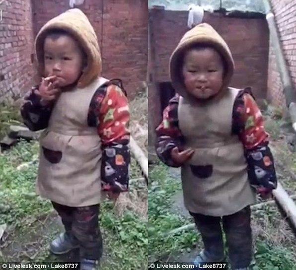 Video of Chinese toddler smoking a cigarette while dad encourages him ...