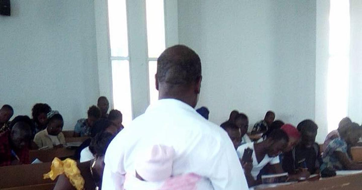 Professor helps woman to take care of her crying child during exam ...