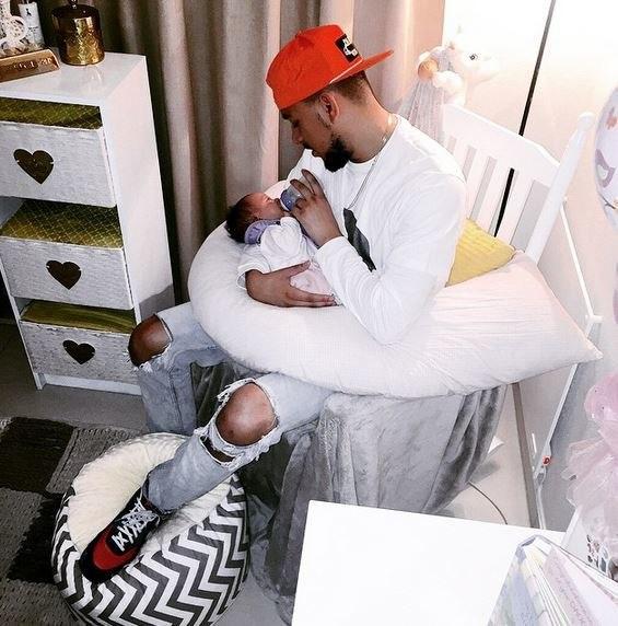 See South African rapper feed his baby daughter | Pulse Nigeria