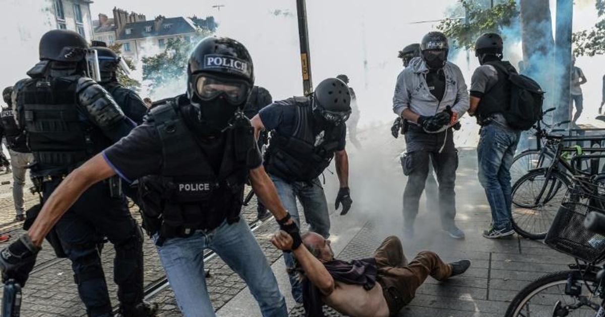 French police clash with protesters marking death of festival-goer ...