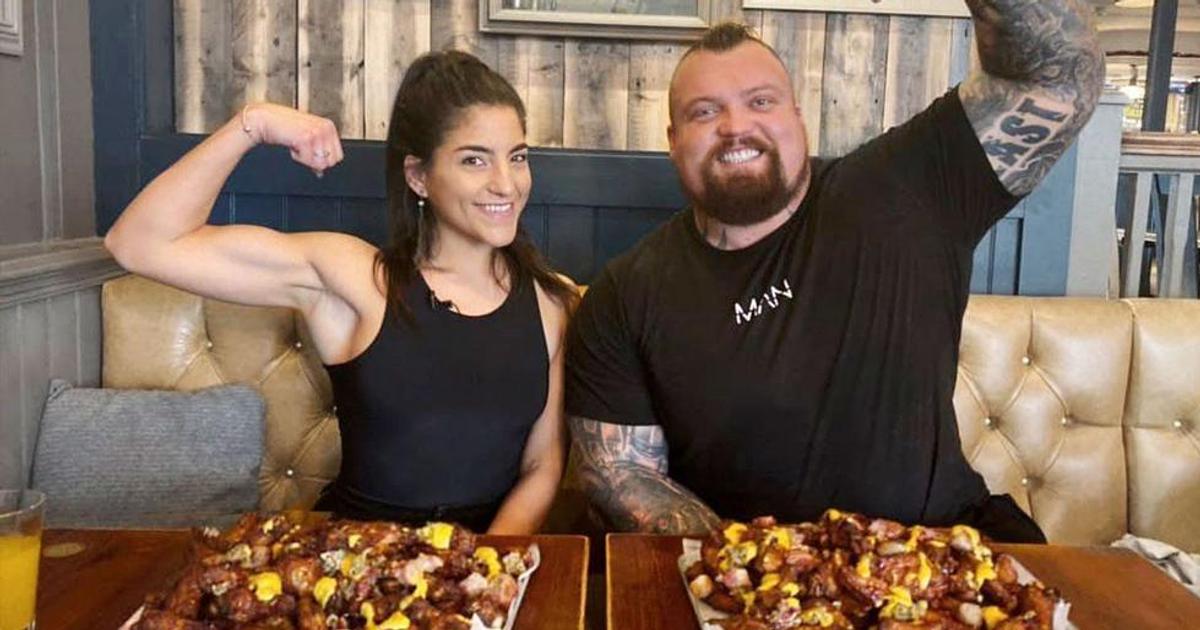 Watch This Woman Crush Strongman Eddie Hall in a Wing Eating Contest ...