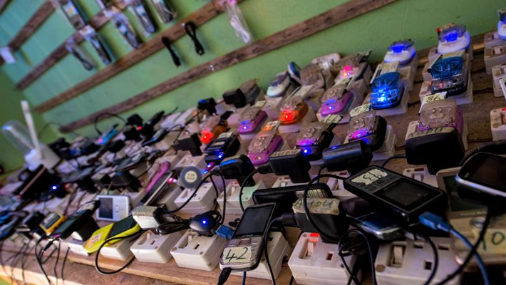 Power outages boost demand for phone charging services in Jos, amid ...