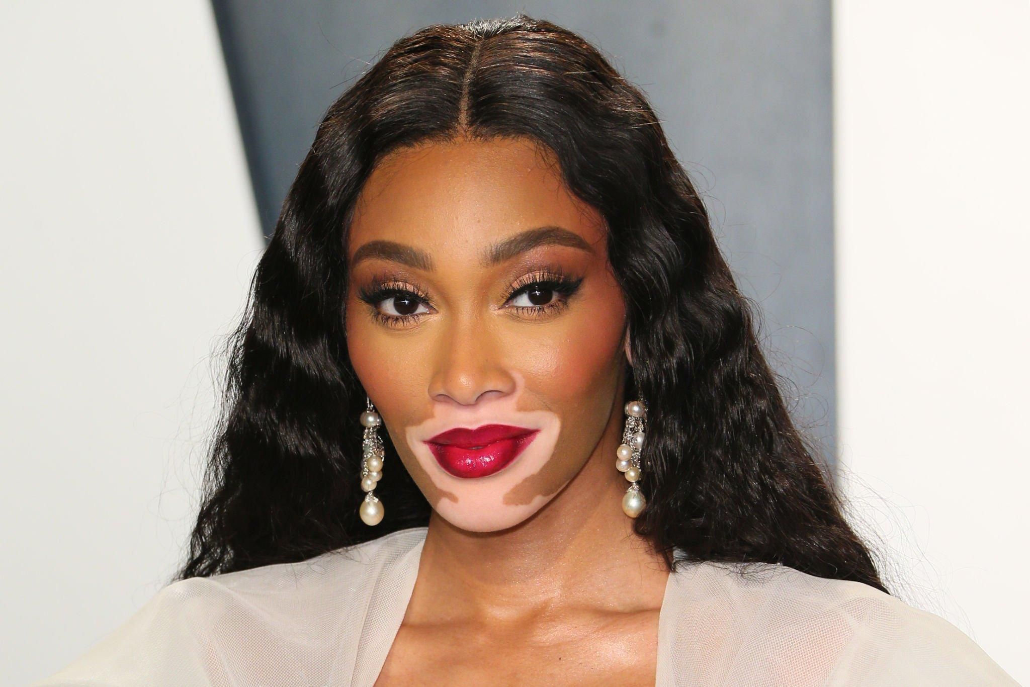 Winnie Harlow stuns in purple themed-outfit at Formula E World ...